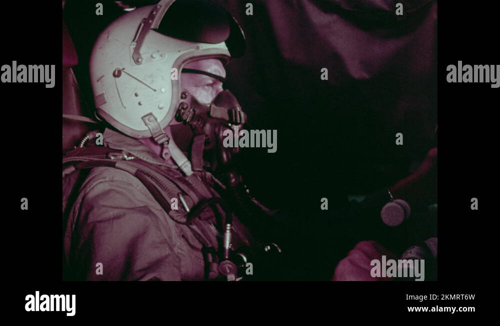 1960s: Slate. Pilot wearing an eyepatch moves controls. Pilot moves a ...
