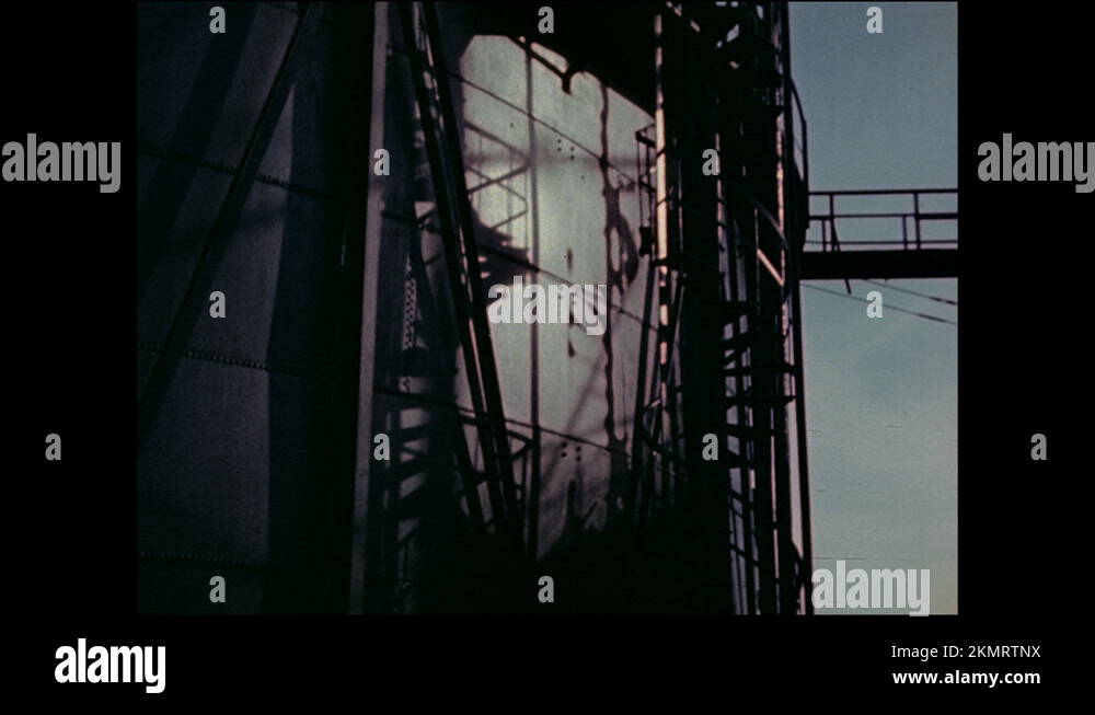 1940s: Nuclear shadows appears behind spiral staircase and metal struts ...