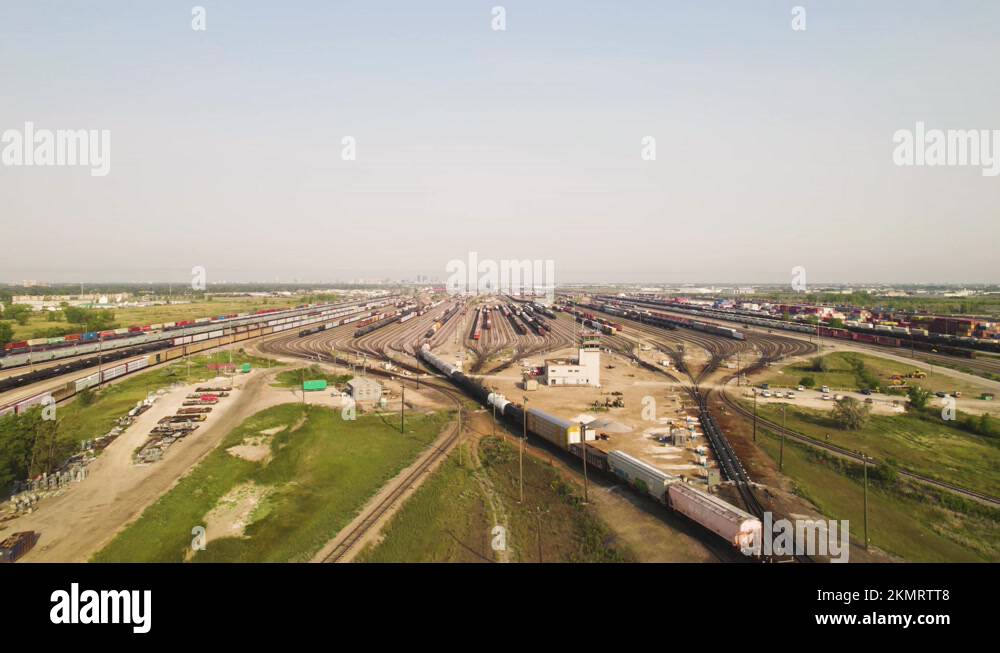 Long flight over huge industrial rail yard on the Canadian prairies ...