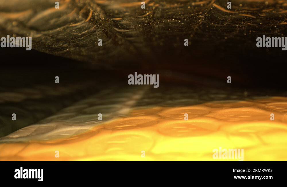 Moving quickly into a car shade where the bottom is bright yellow to ...