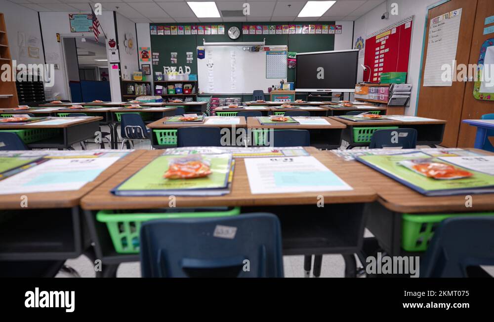 Camera slide to left showing wide angle view of empty school classroom ...