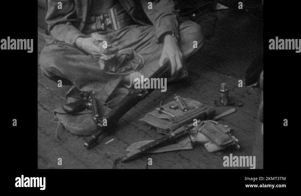 1940s: Man looks at photo with magnifier. Hands point to map. Soldiers ...