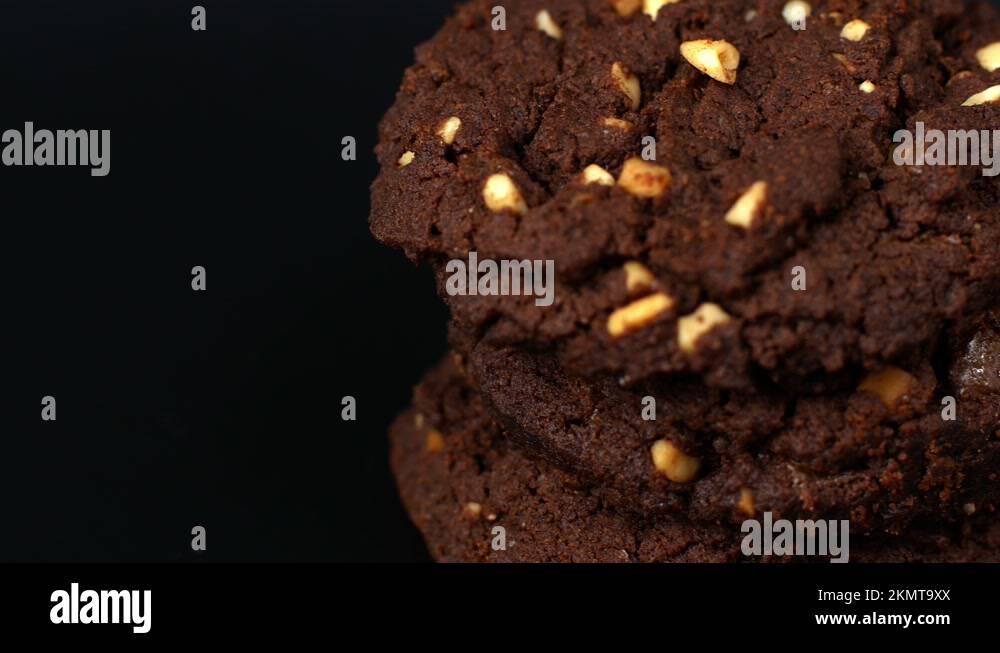 Slider close-up filming of chocolate chip cookies. Food biscuits close ...