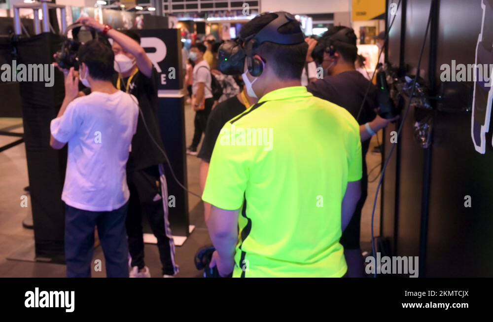 Visitors play Virtual Reality (VR) games during the Anicom and Games ...