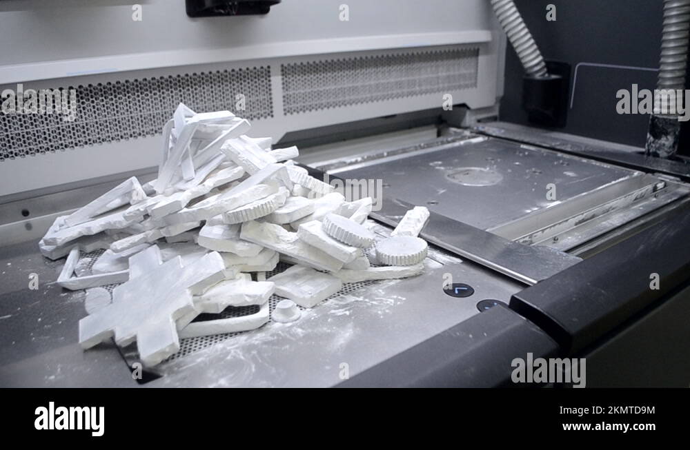 Objects and models printed on industrial 3D printer from white plastic ...