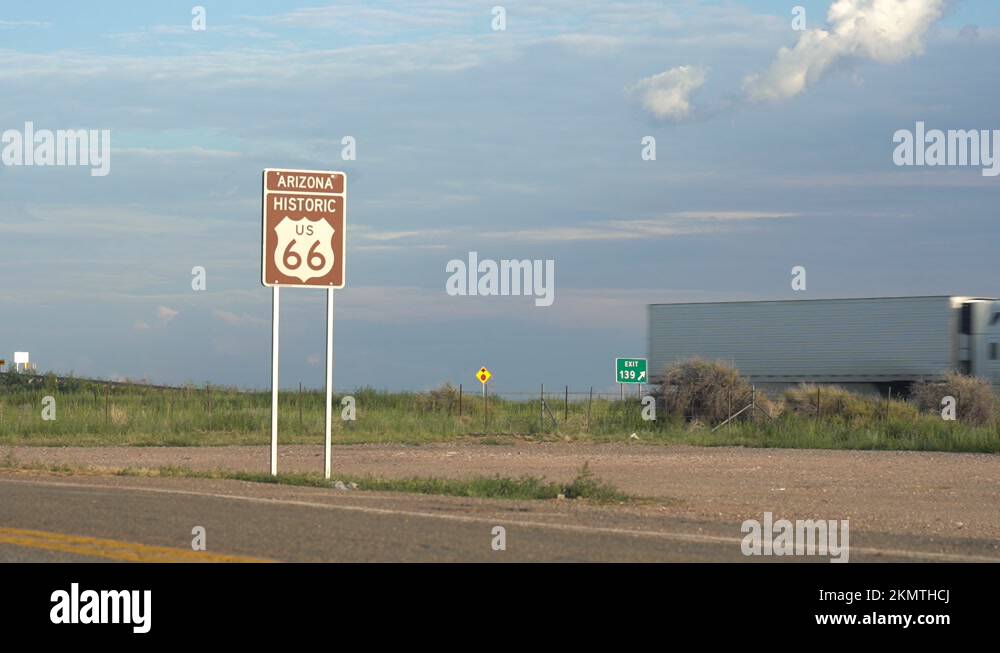 Semi trucks passing on an interstate highway next to old Route 66 Stock ...