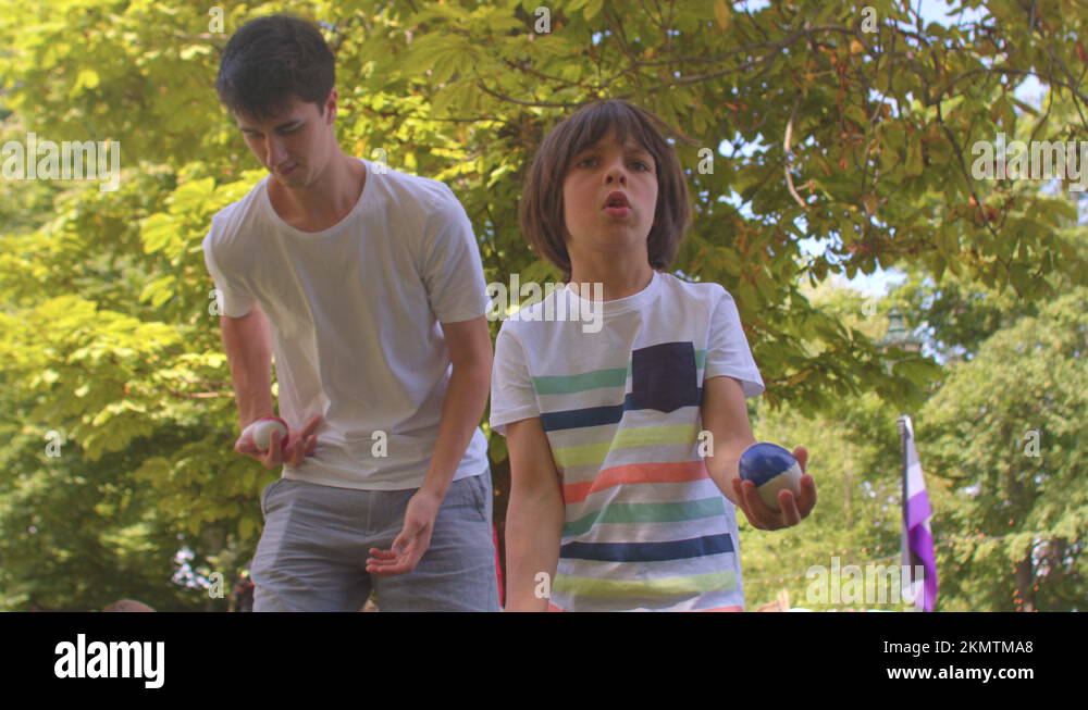 Boy and teacher with balls. Learning to juggle impact growth neural ...