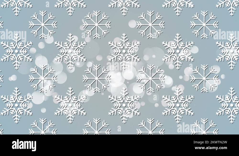 Animation of multiple snow flakes over glowing spots on blue background ...