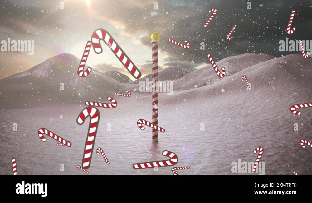 Animation of falling candy canes over winter scenery with north pole ...