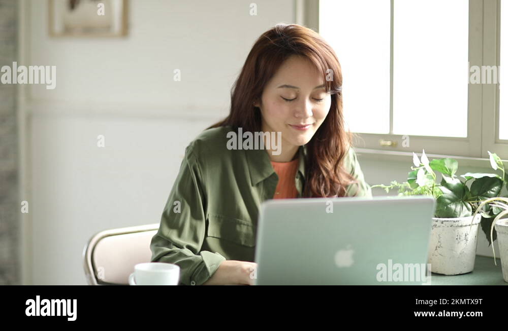 woman operating a computer in the room Stock Video Footage - Alamy
