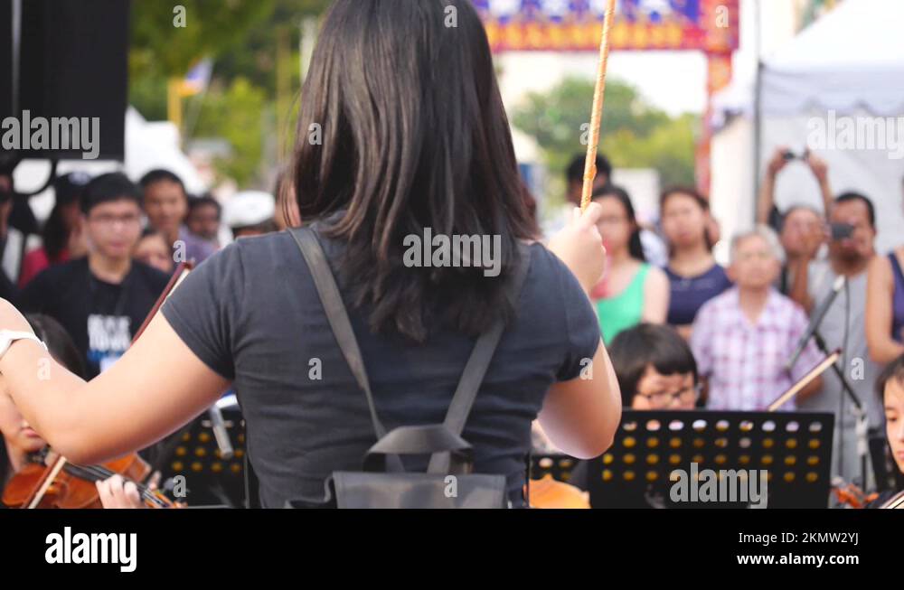 Female orchestra conductor Stock Videos & Footage - HD and 4K Video ...