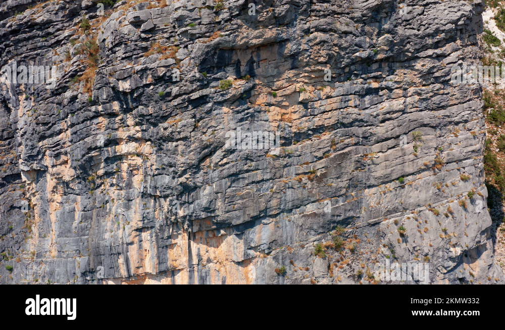Rough surface and texture of rock on a vertical cliff. Geological ...