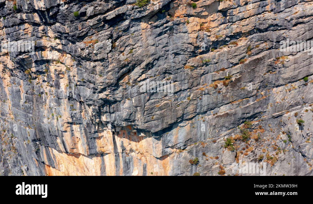 Rough surface and texture of rock on a vertical cliff. Geological ...
