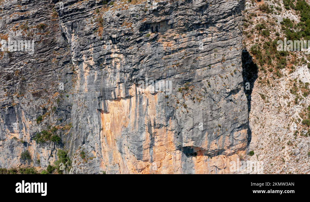 Rough surface and texture of rock on a vertical cliff. Geological ...