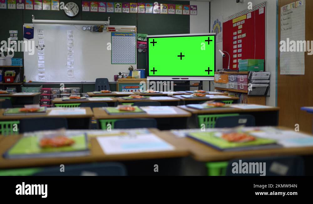 Interactive white board with green screen chroma key in empty school ...