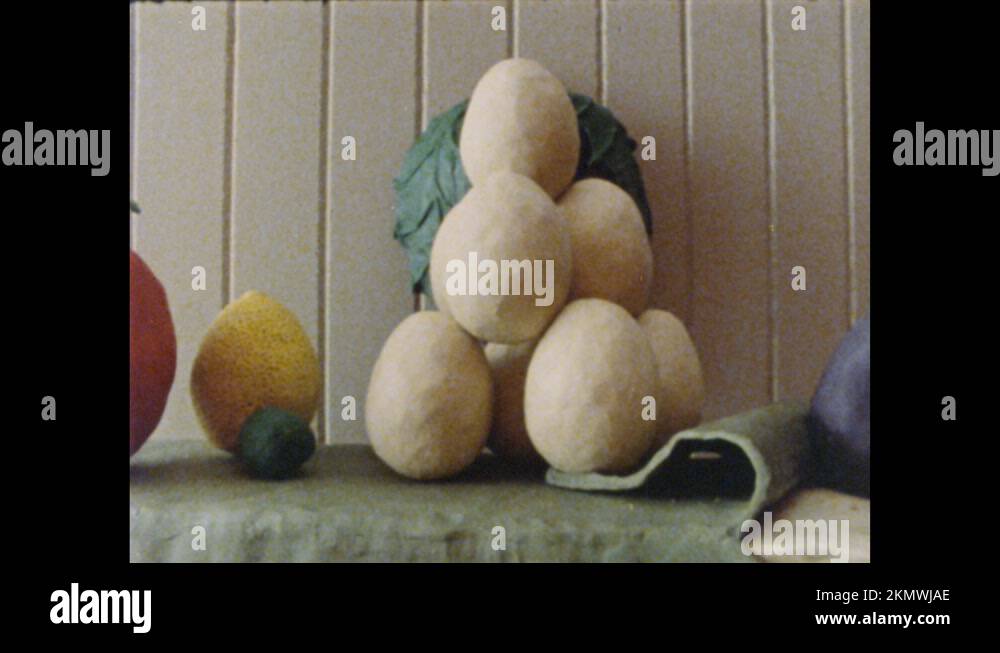 1970s: Claymation. Eggs form pyramid. Olive pushes lemon away. Food ...