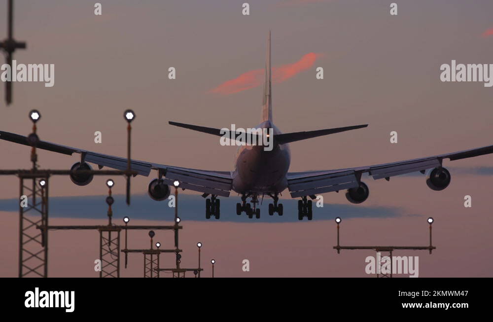 huge cargo airplane boeing 747 jumbo jet arrival night sky rear view ...