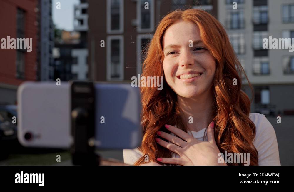 Beautiful Happy Young Girl Having Wireless Tripod Making a Video call ...