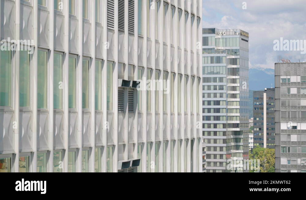 Office skyscraper exterior wall parallax motion with cityscape in ...