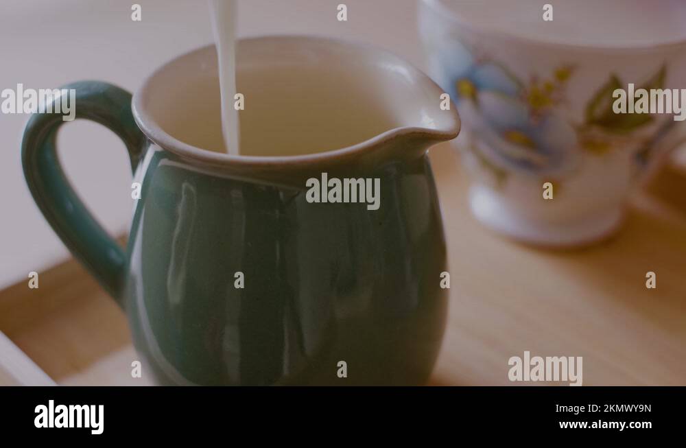 Jug pouring milk Stock Videos & Footage - HD and 4K Video Clips - Alamy