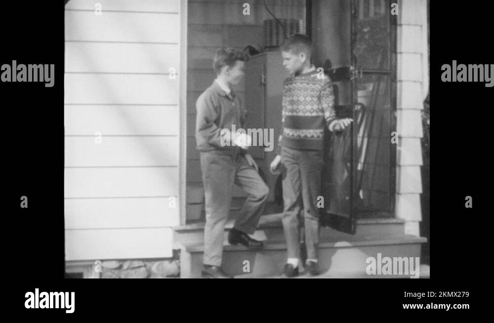 1950s: Woman sorting cutlery. Kids coming out of the house. Man deep in thought Stock Video ...