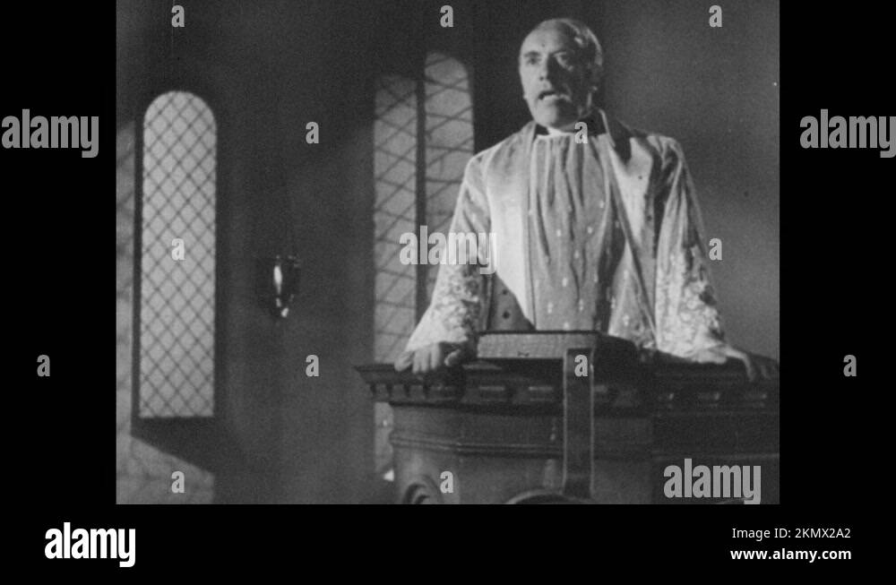 1940s: Priest speaking at pulpit. Pastor speaking at pulpit. Professor ...