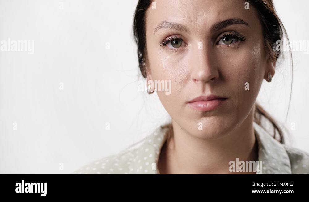 Woman is crying, tears. Woman with tears on her face on white ...
