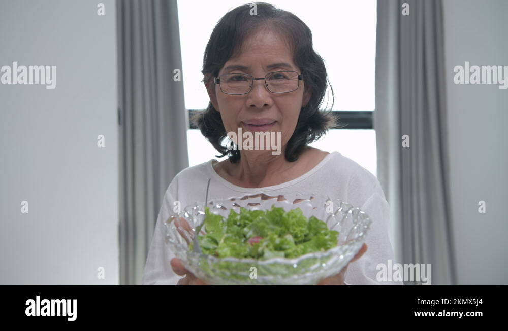 Health concept of 4k Resolution. Old Asian women are introducing ...