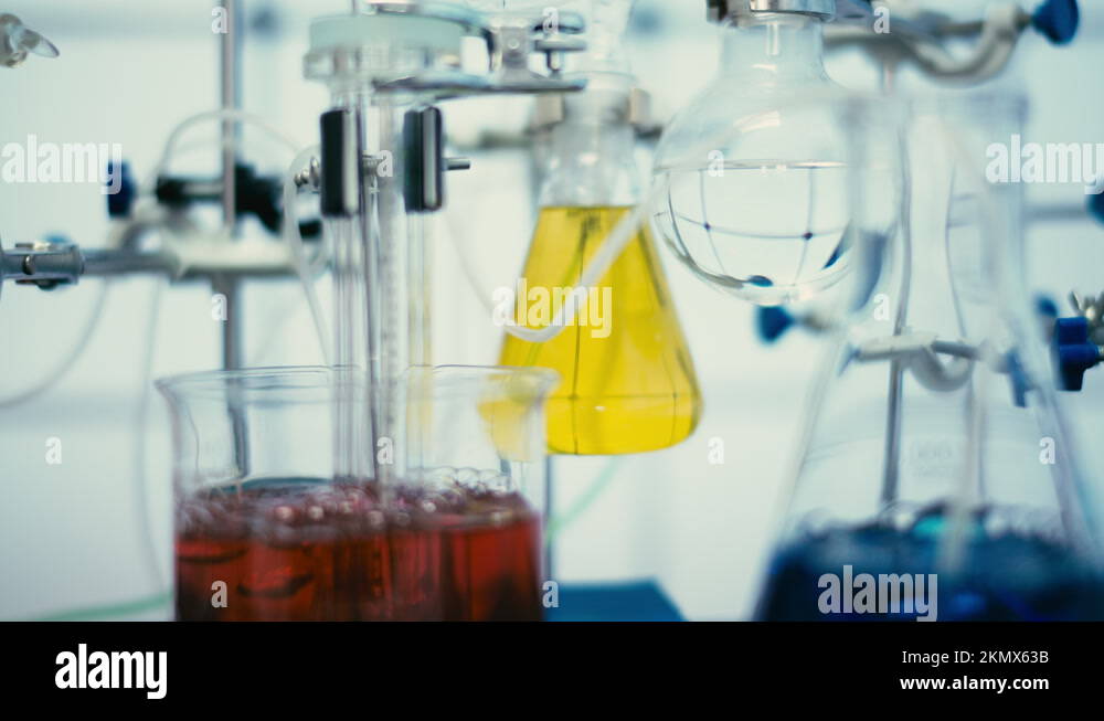 Chemical laboratory with flasks and test tubes. Chemical process with ...