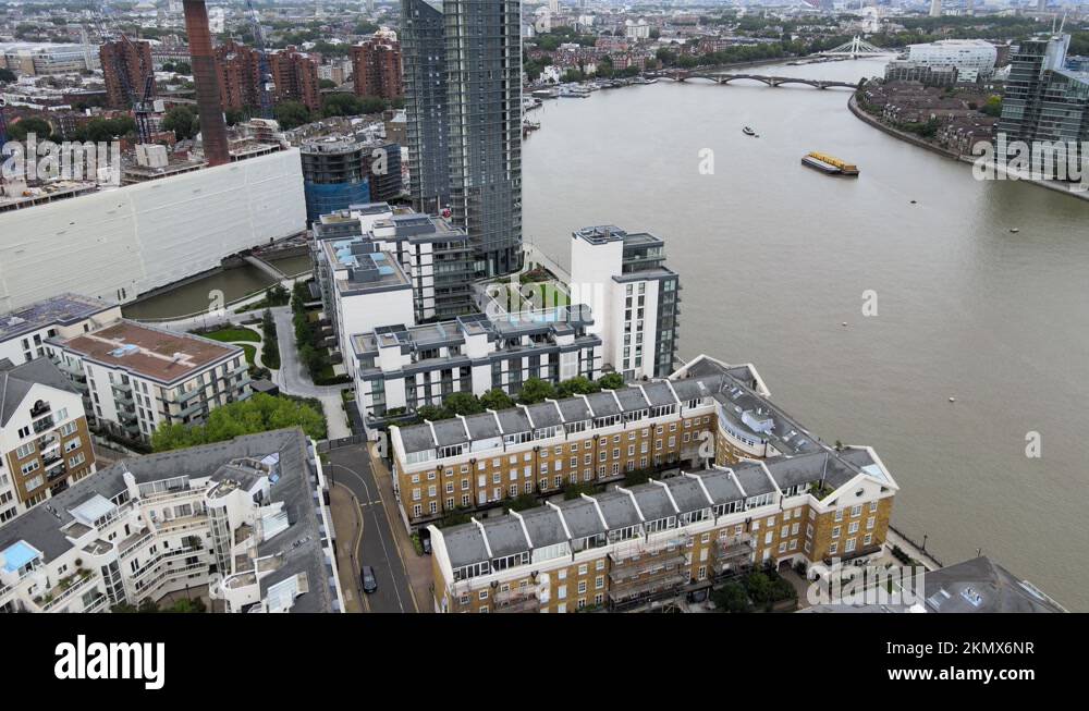 Residential buildings on waterfront, modern towers with glass facade ...