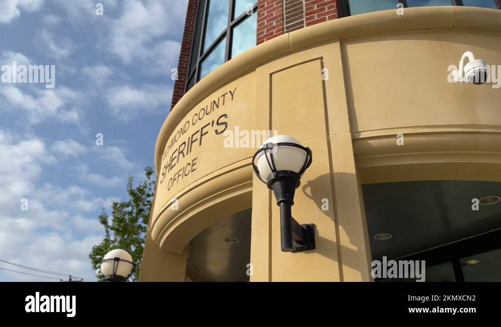 Pan of police station and police car Stock Video Footage - Alamy