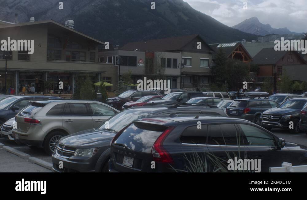 Full parking lot in downtown Banff with mountains in Banff Stock Video ...