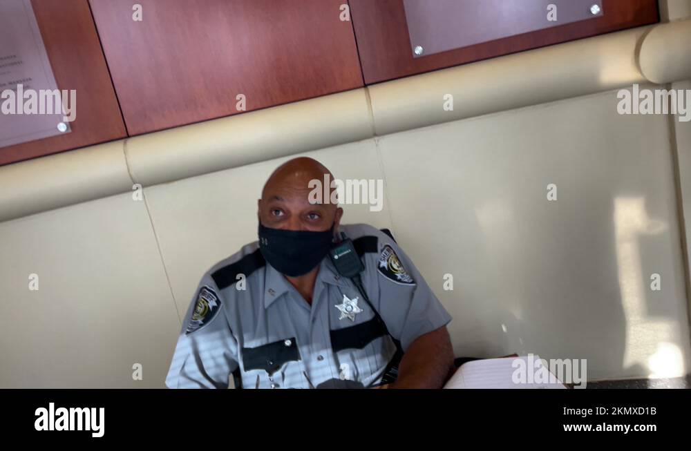 Richmond County Sheriffs Department Interior officer hands face mask ...