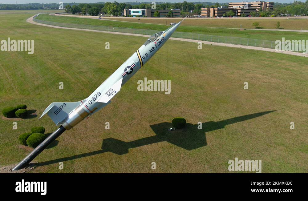 2021 - Good aerial around a fighter jet displayed at the front of the ...