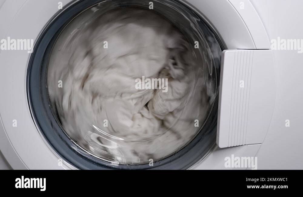 Washing clothes in a washing machine. 4k Stock Video Footage - Alamy