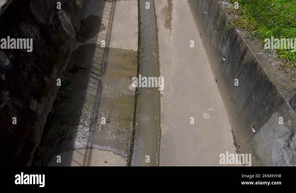 Empty flood drains and canals in Singapore. Climate change concept ...
