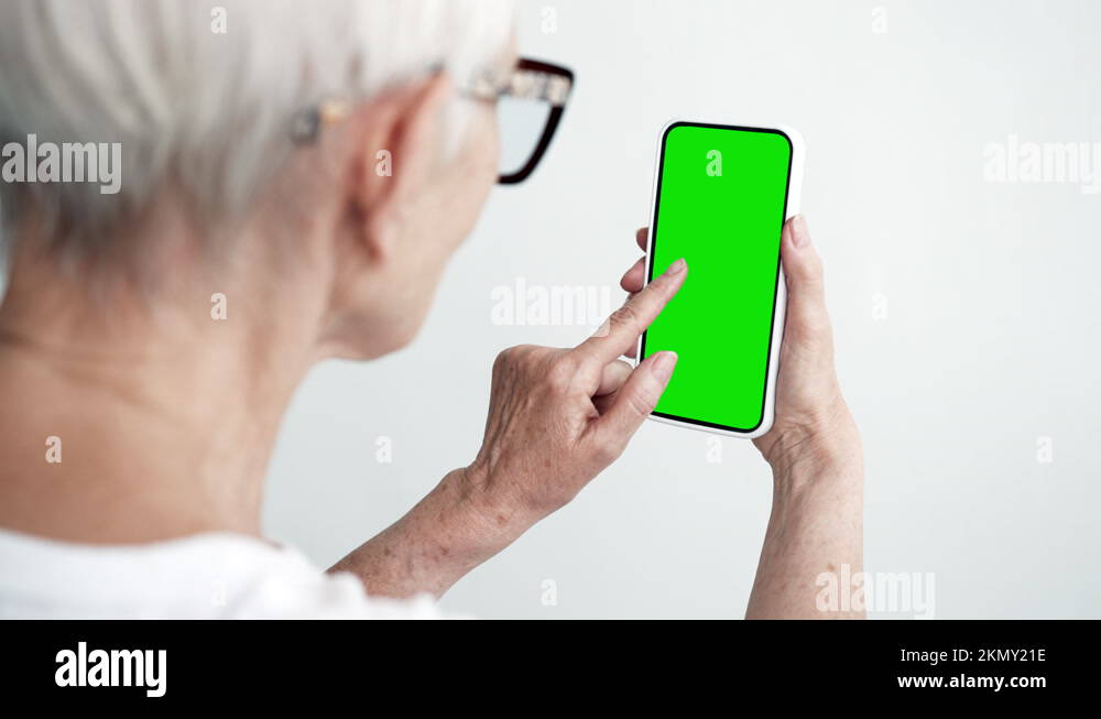 Older 60s Person Hand Touch Smartphone with Green Screen Chroma Key ...
