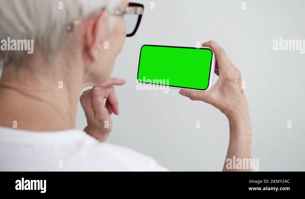 Older 50s Person Hand Touch Smartphone with Green Screen Chroma Key ...