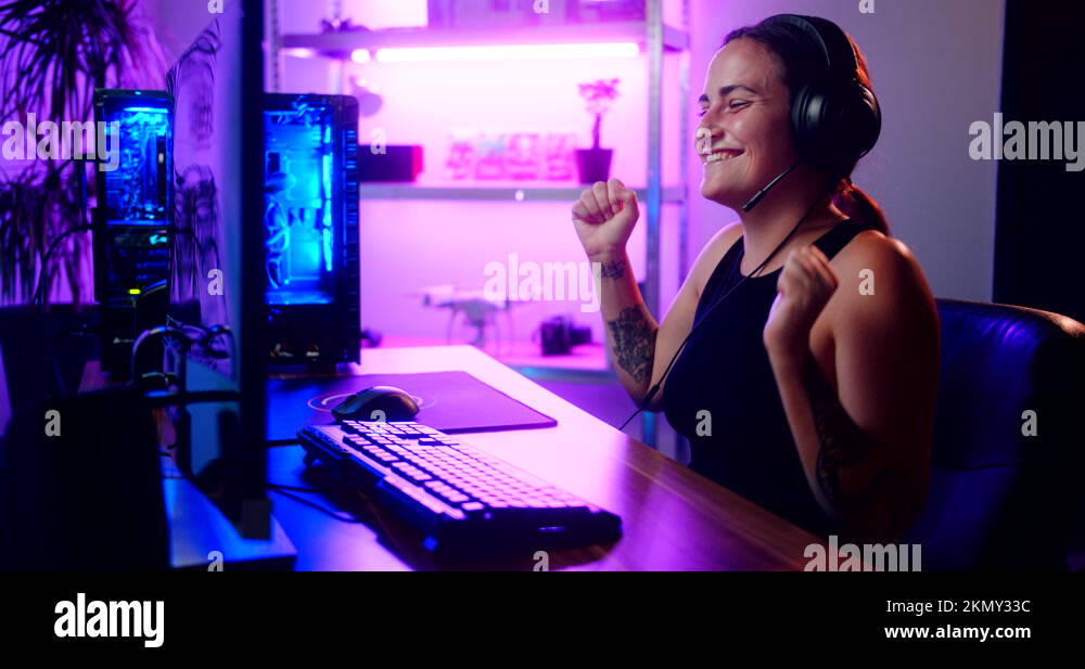Girl gamer celebrates online computer win by happily dancing at her ...