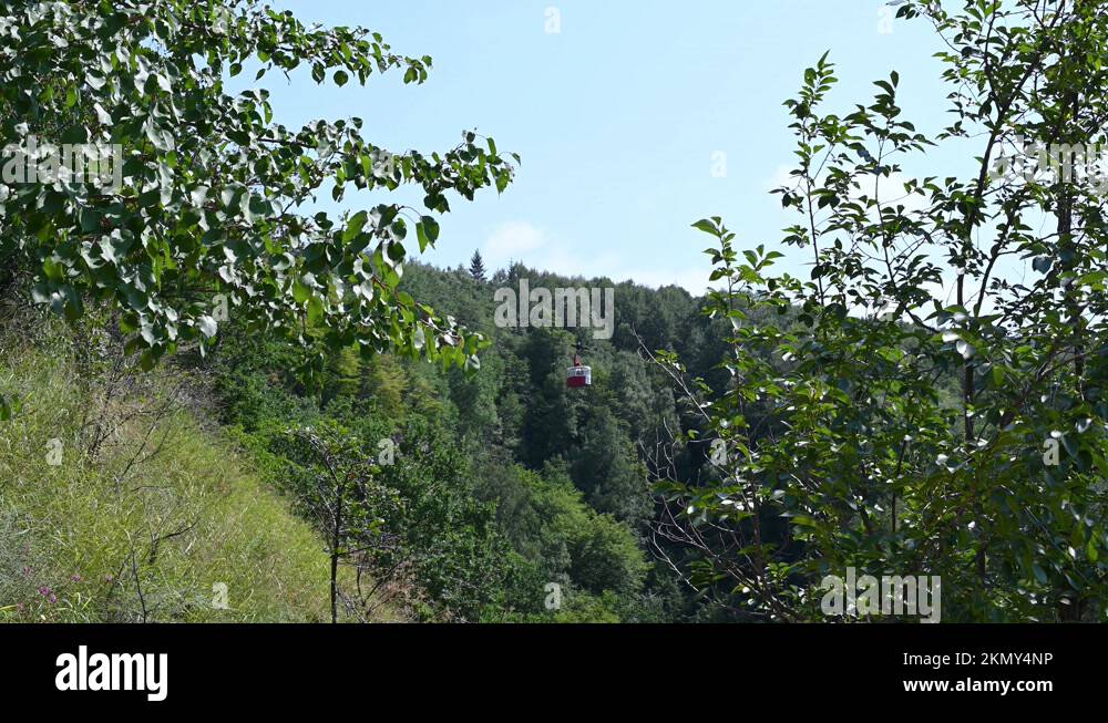 the cable car cabin moves through the park in Kislovodsk in the Valley ...