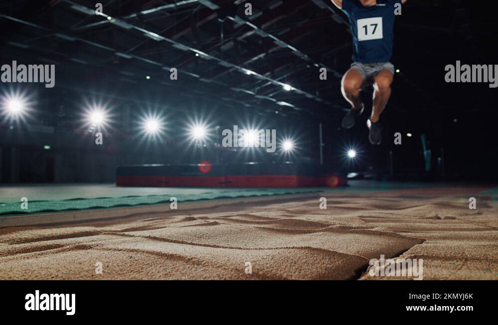 Man Doing Long Jump Stock Video Footage - Alamy