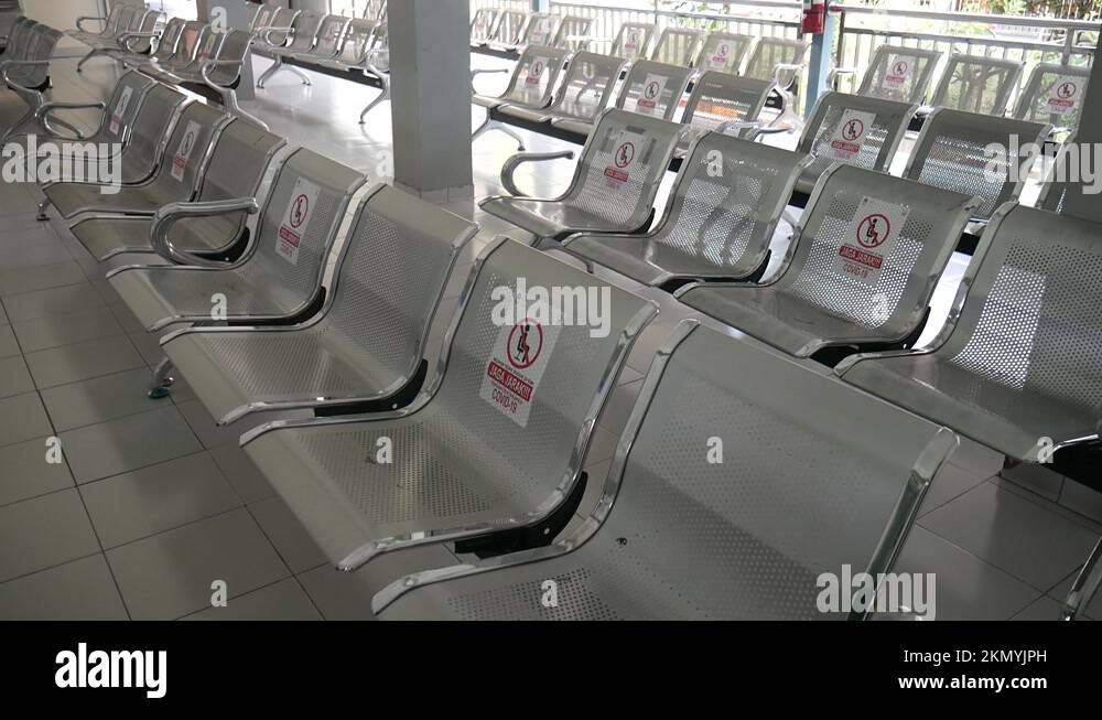 Rows of seats with no sitting signs to maintain distance. Prevention of ...