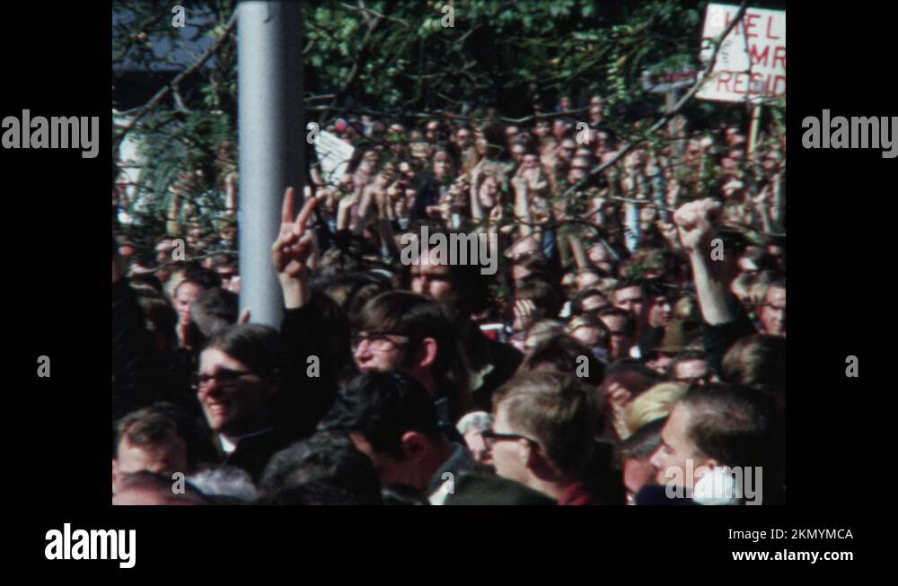 1970s: Crowd of people cheer at Richard Nixon campaign rally. People ...