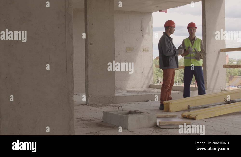 Builders talking on construction site Stock Videos & Footage - HD and ...