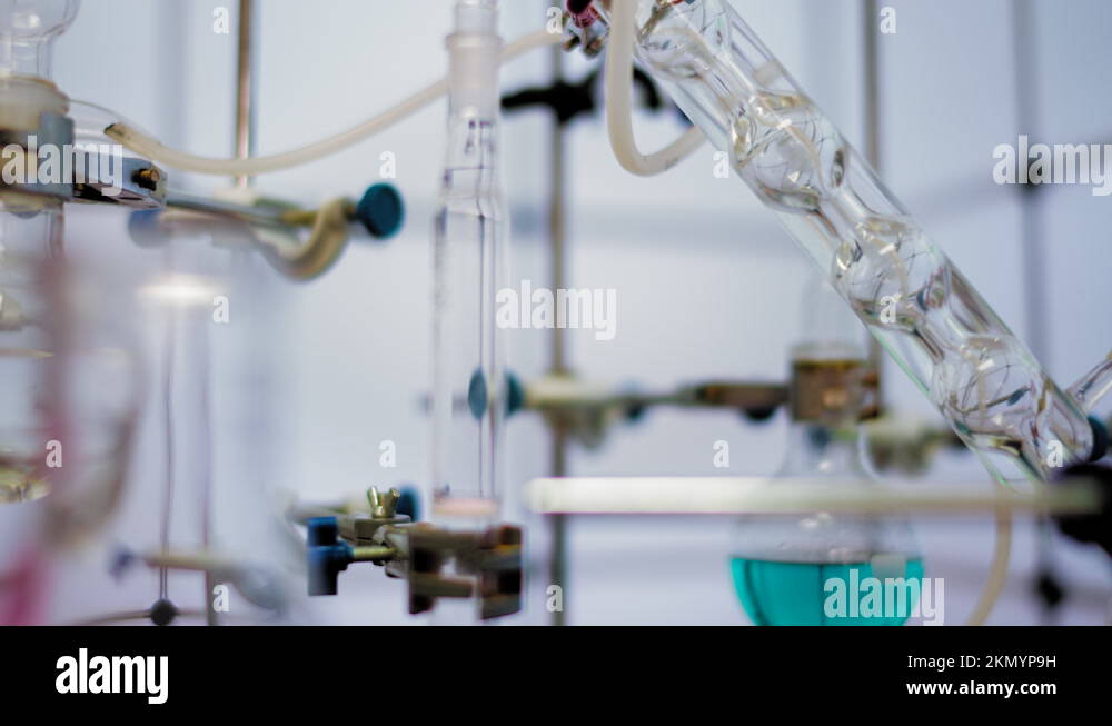 Chemical laboratory with flasks and test tubes. Chemical process with ...