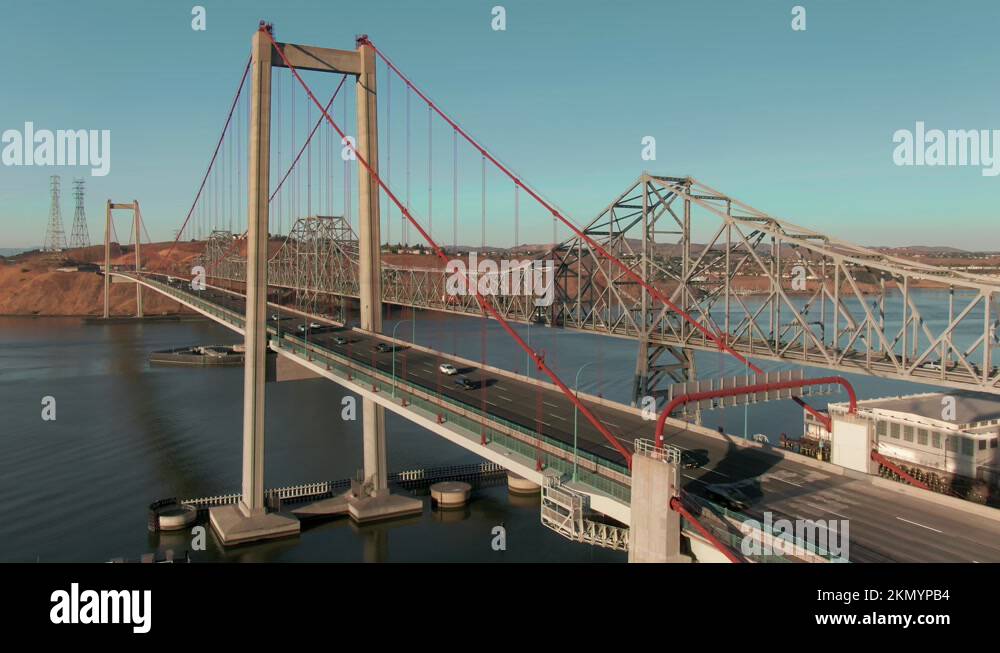 Aerial: Alfred Zampa Memorial Bridge and Carquinez bridge. Oakland, USA ...
