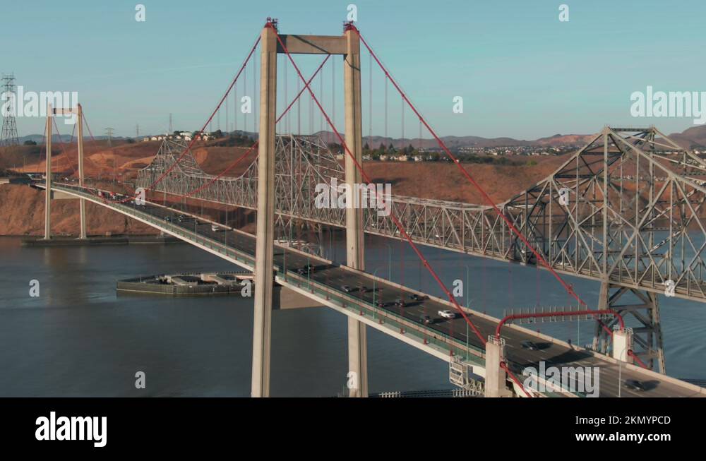 Aerial: Alfred Zampa Memorial Bridge and Carquinez bridge. Oakland, USA ...