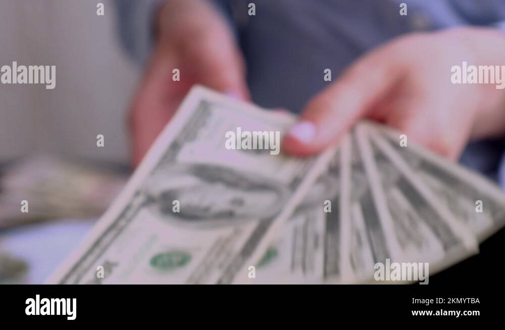 Business Woman Displaying a Spread of Cash US dollars. Close-up. Income ...