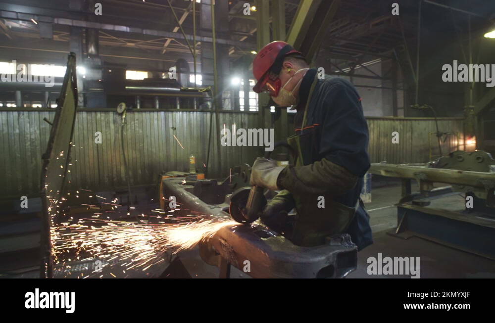 Grinding A Metal Structure At Factory While Flying Sparks Are Blocked ...
