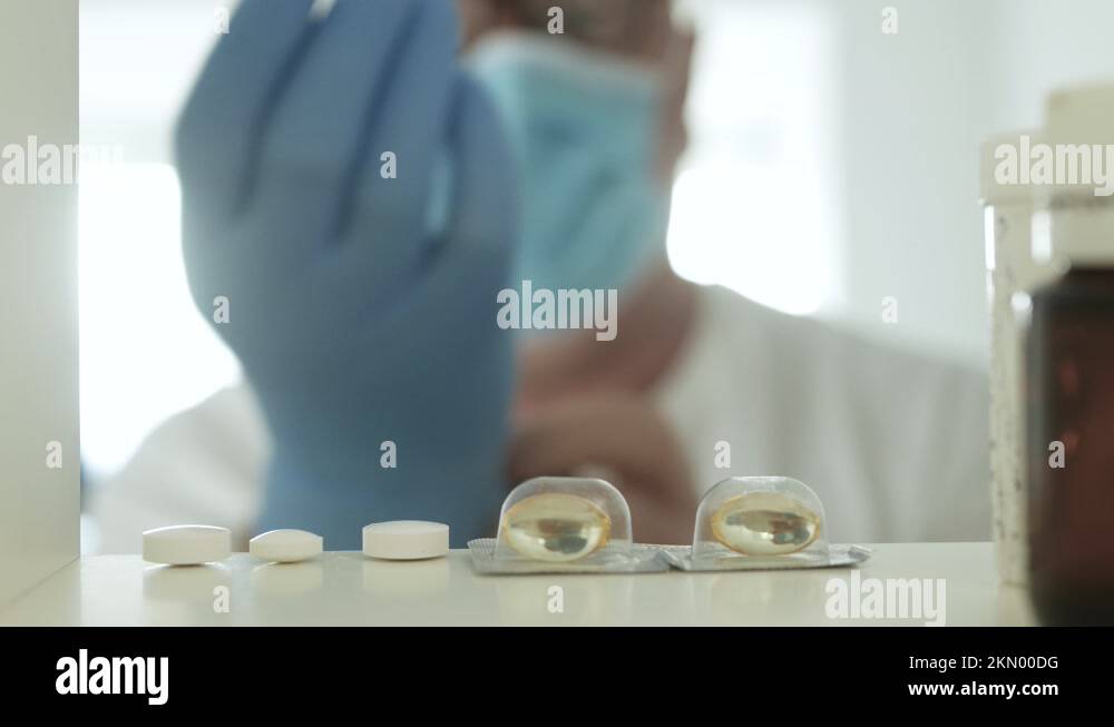 Medical Person Working in a Hospital, Putting on His Hand Medical ...
